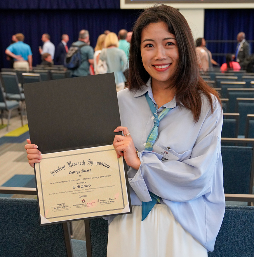 Harbert students' research earns awards Harbert students' research earns awards
